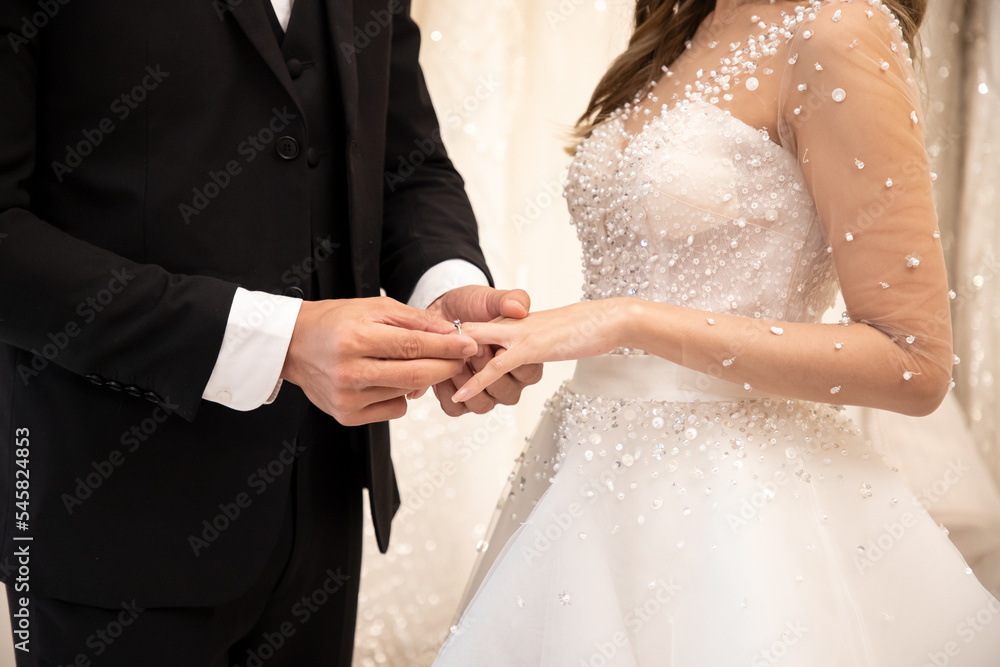 Husband giving of wedding ring for his wife with special moment while ...