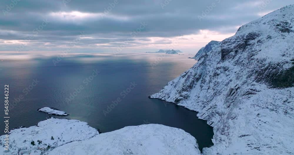Lofoten islands extreme frozen mountain and wintry blue ocean landscape ...