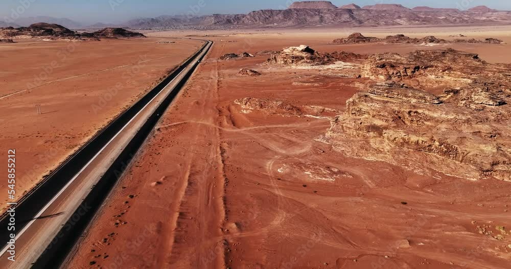 Footage of limestone mountains and a highway at Jordanian Desert on a ...