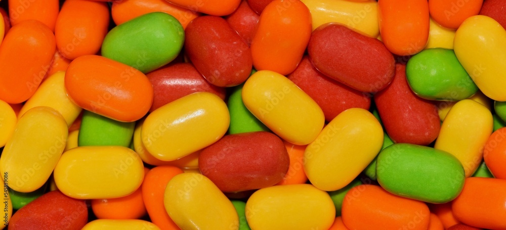 Colorful tic tac candy background in panorama banner format, vibrant ...