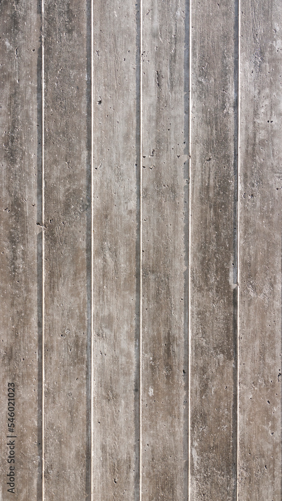 Muro de hormigón gris con lineas verticales paralelas en relieve Stock ...