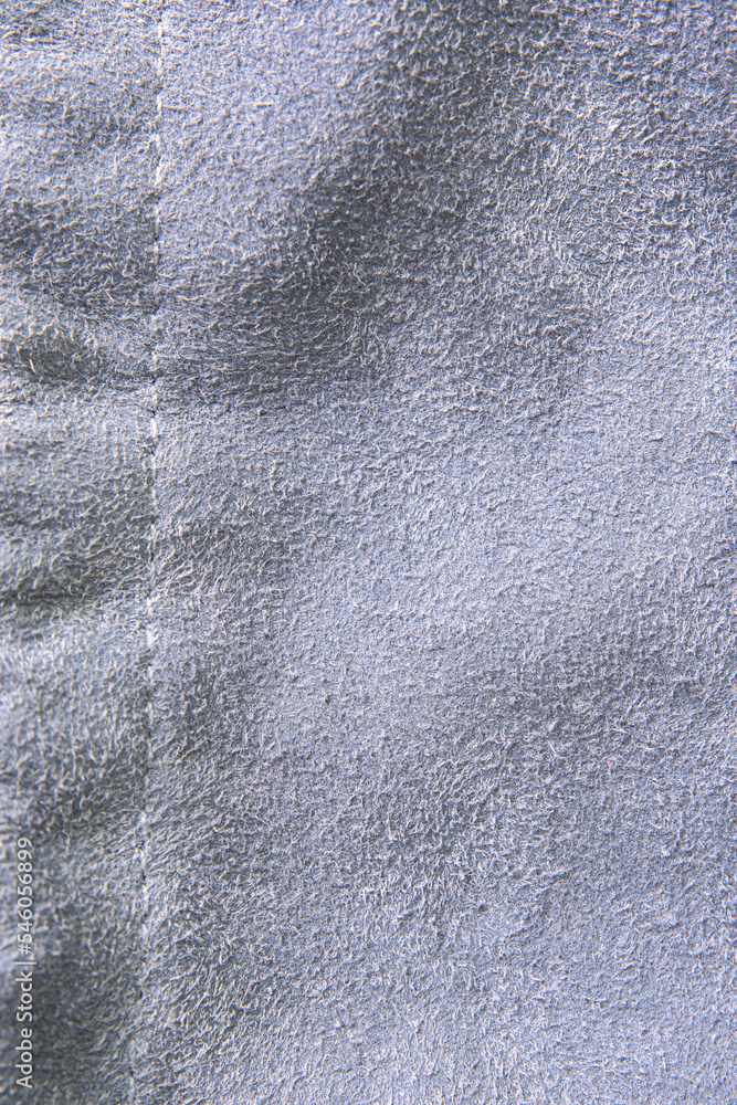 Texture of soft artificial fabric with a vertical stitched seam ...