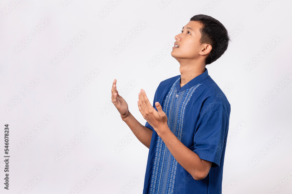 Smiling Asian muslim man happy celebrating Eid Al-Fitr isolated white ...