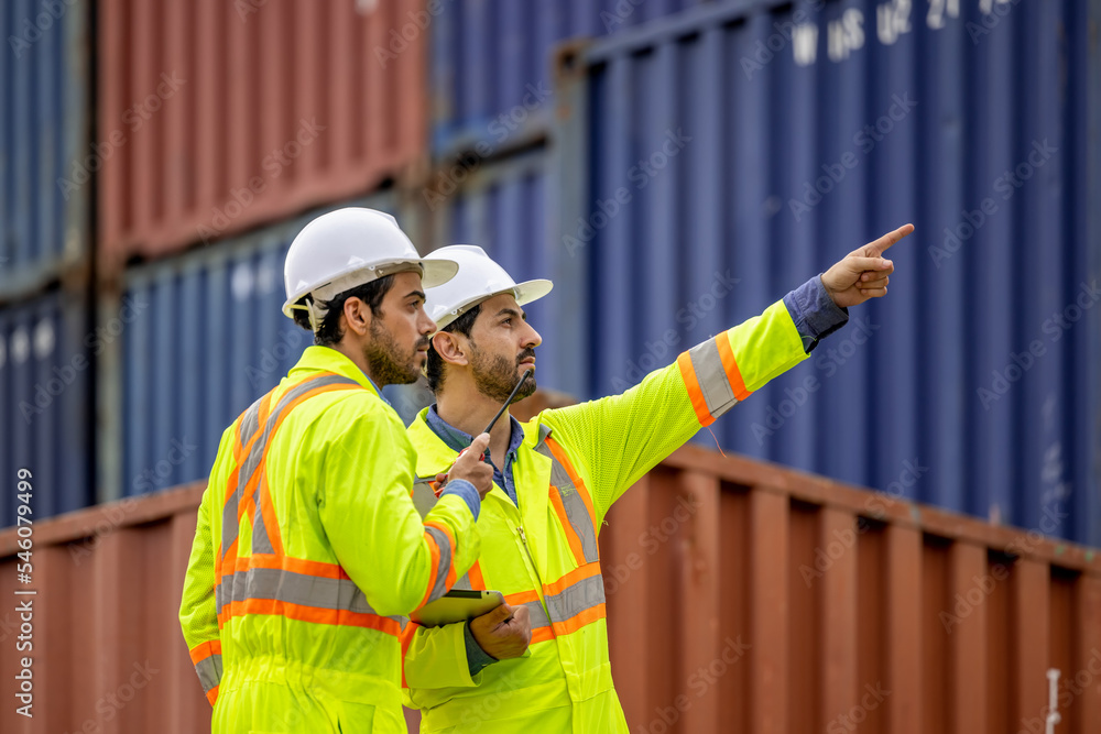 Foreman control loading containers box from factory to cargo freight ...