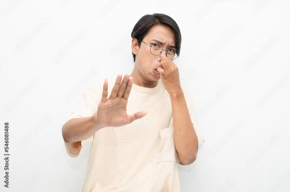Ew Its So Gross A Young Asian Man Displaying An Expression Of