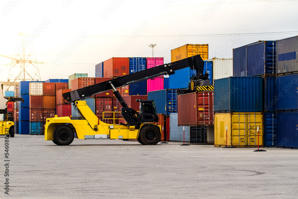 Forklift handling cargo container. Freight container loading. Container ...