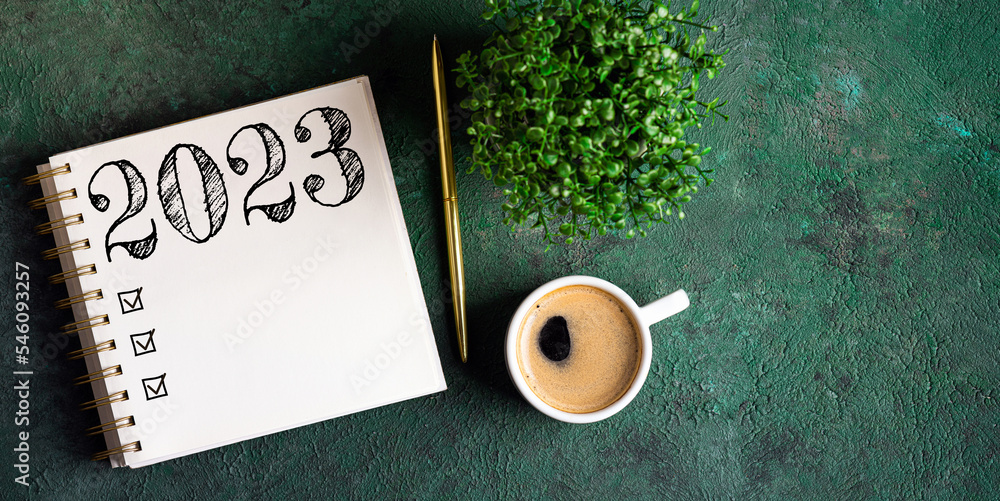 New year resolutions 2023 on desk. 2023 resolutions list with notebook ...