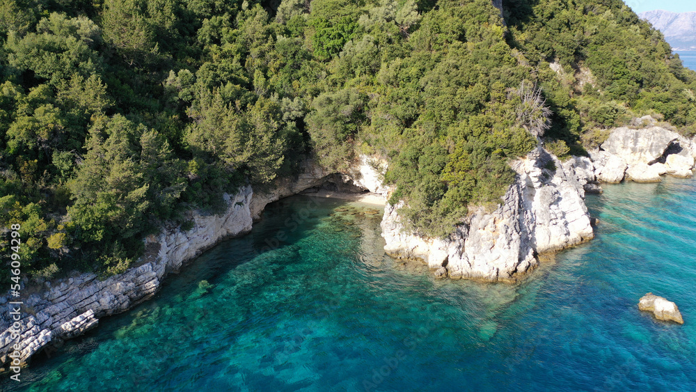 Aerial drone photo of famous small bay and beach with crystal clear sea ...