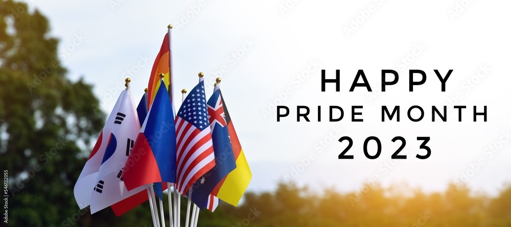 'Happy Pride 2023' on bluesky, flags of many countries and rainbow ...
