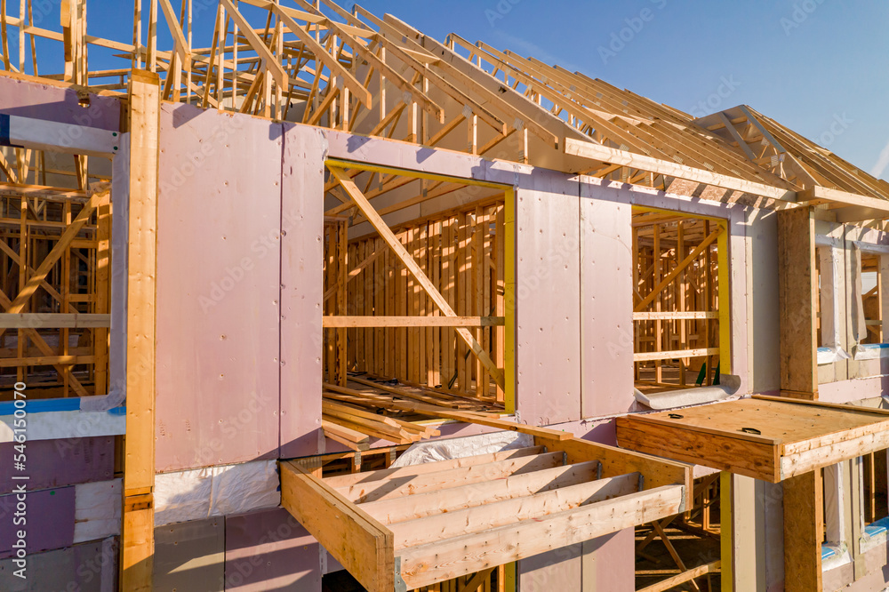 New city housing under construction made of stick framing structure and ...