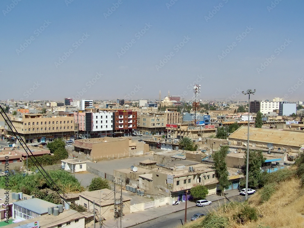 Overhead view of apartment buildings and a mosque, seen from the ...