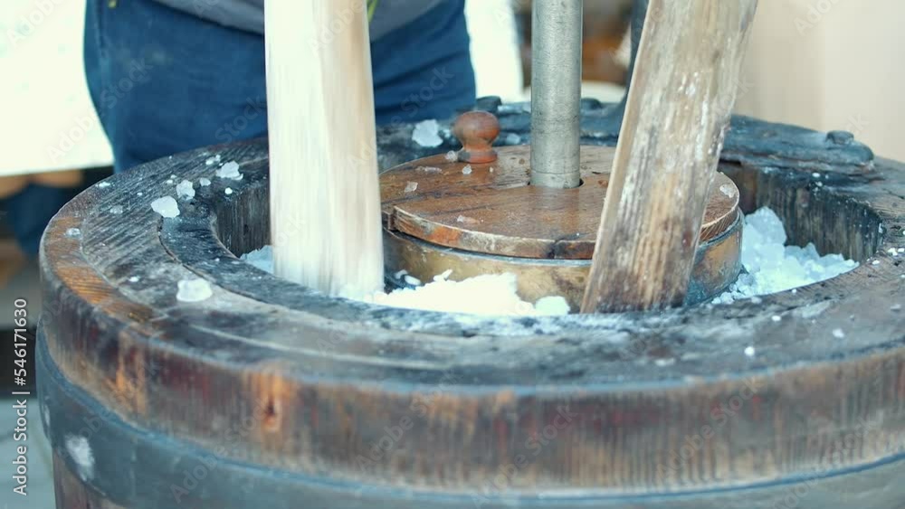 Close Up Of Pouring And Breaking Ice Cubes In Vintage Ice Cream Machine ...