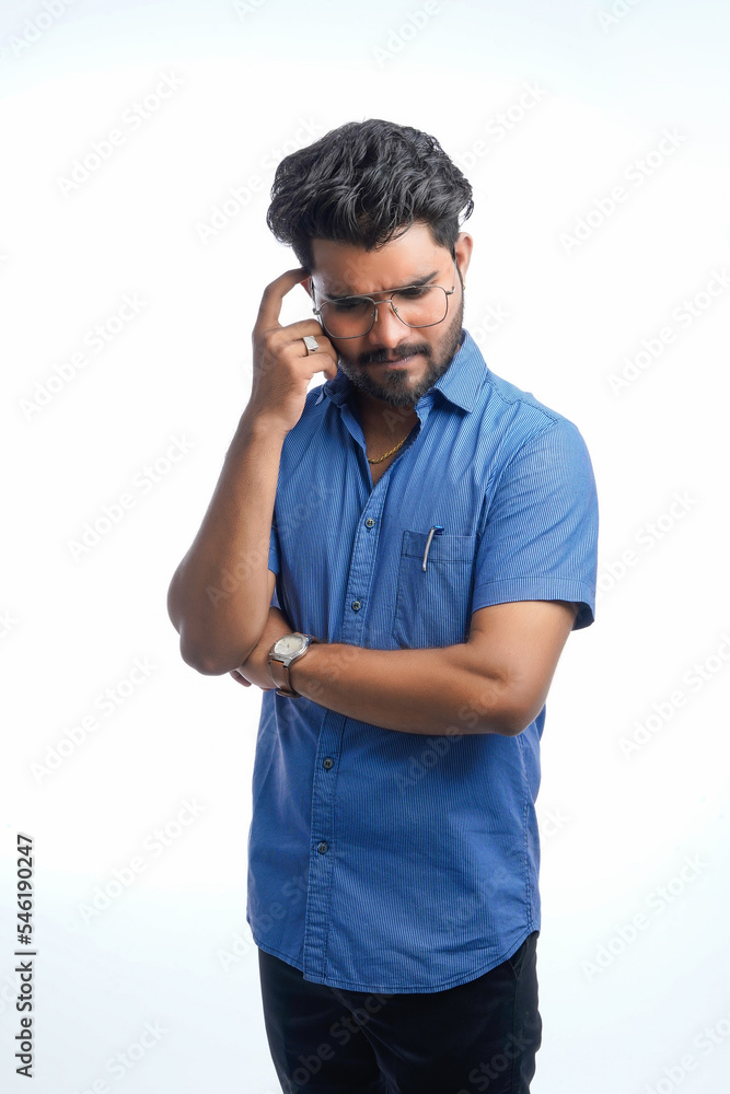 solution of problem. young cute man disposes of a problem. looks up ...