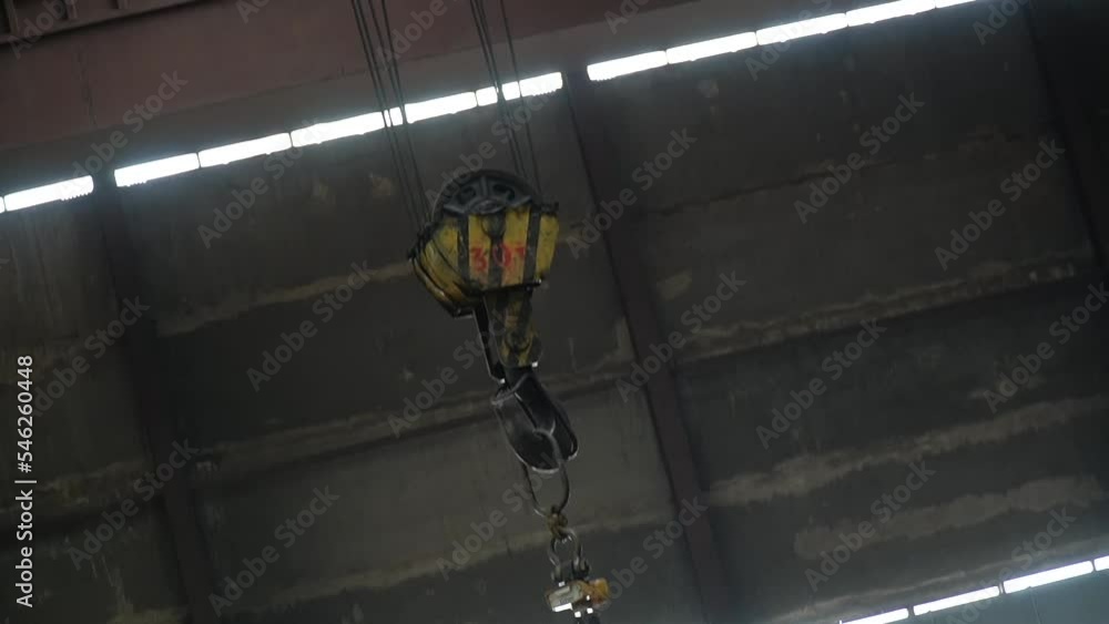 Video „Construction crane works at the factory. Hook movement and ...