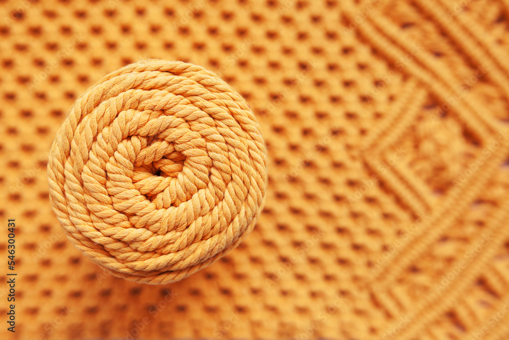 Handmade macrame braiding and cotton threads on ornate background ...