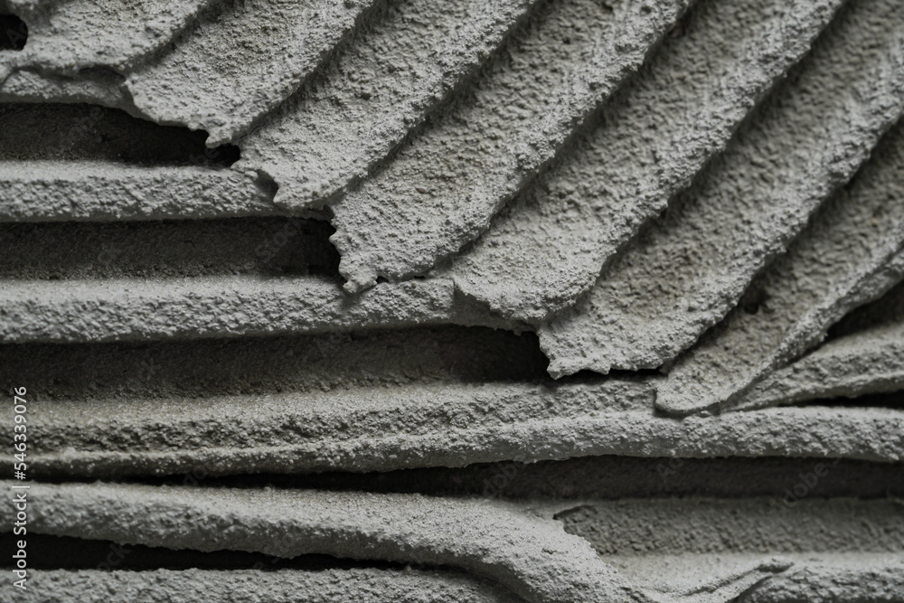 Foto de Cementitious adhesive applied to floor or wall ready to receive ...