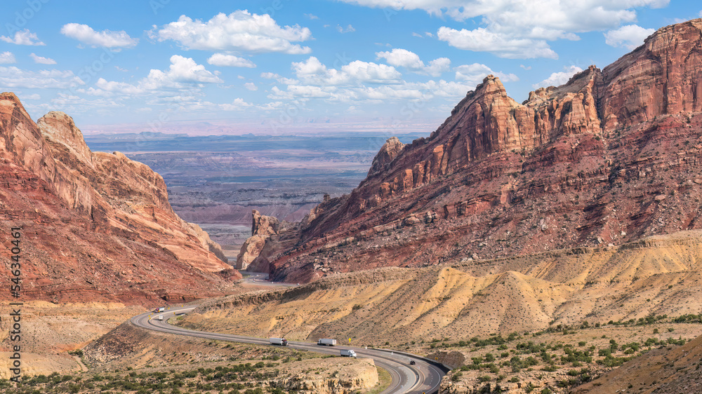 Driving in the desert down the winding Interstate 70 through Spotted ...
