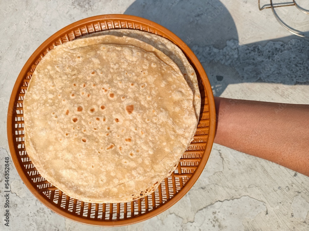 Chapati, also known as roti, rotli, safati, shabaati, phulka, chapo ...