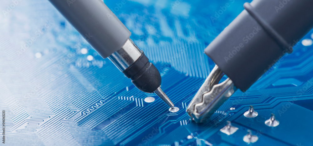 Measuring electronic signal using oscilloscope on the PCB. Electronics ...