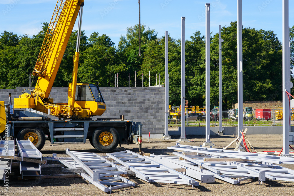 Construction site of a new industrial building with vertical steel ...