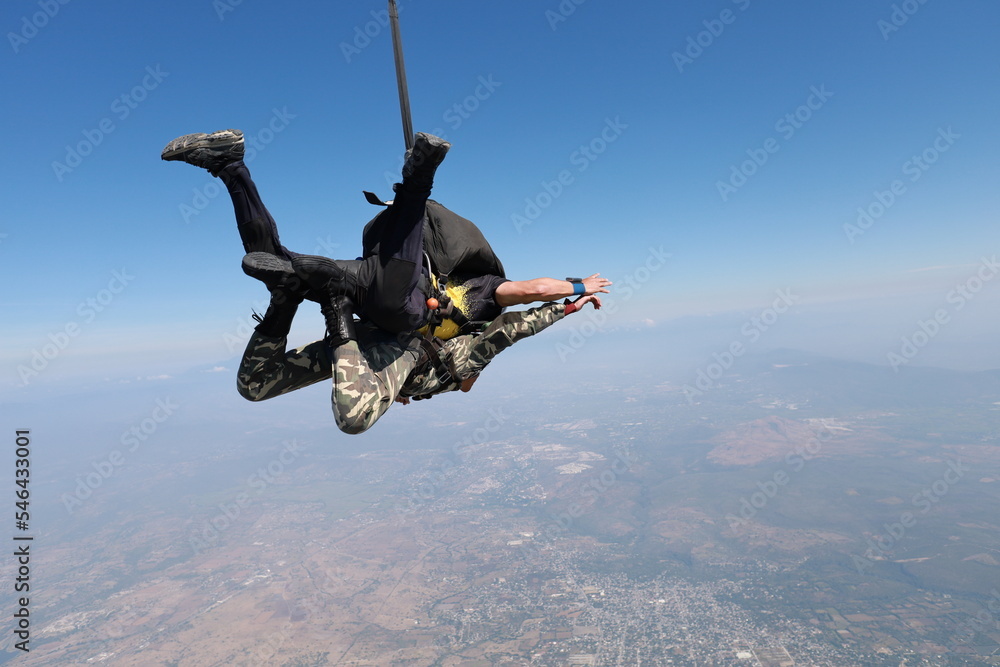 Poster Tandem skydiving. Free falling. Back view. – Wall Art | UkPosters