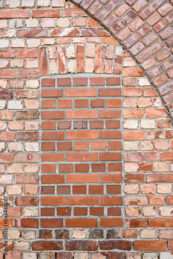 Bricked over doorway in historic brick wall, closed off for modern ...