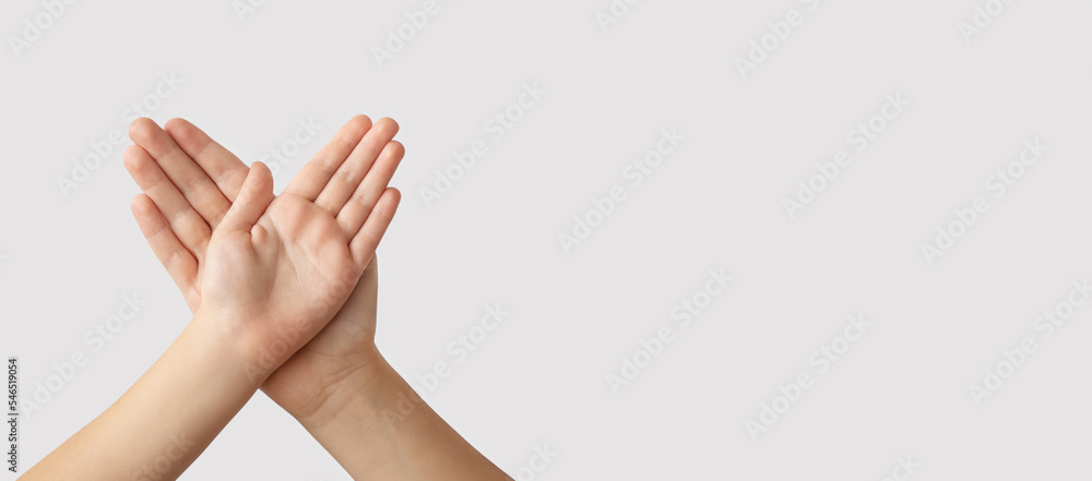 Human hands palms over white background. Concept of child support, care ...