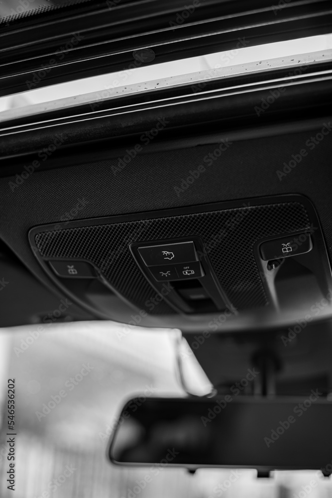 Lighting switches control panel inside a luxury car; showing interior ...