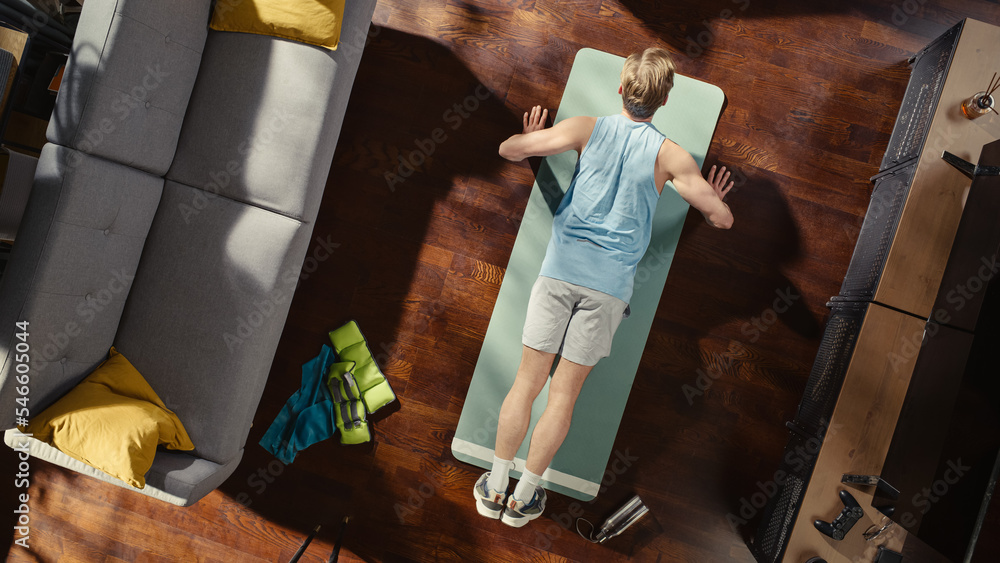 Foto de Top View Sport Concept: Attractive Guy Doing Push-ups Exercise ...