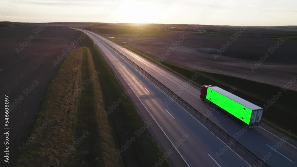 Large truck with the trailer with green screen and markers for tracing ...