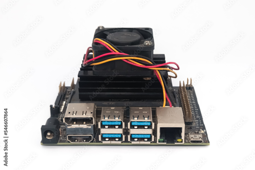 Front view of a mini pc with a dc fan on its GPU on a white background ...