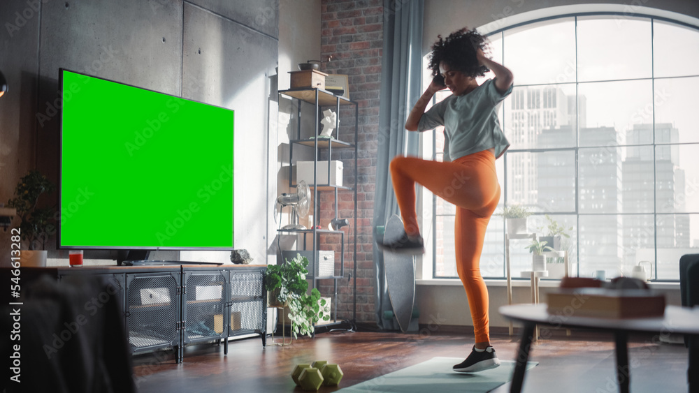 Home Gym: Gorgeous Positive Black Girl Training with Using Green Mock ...