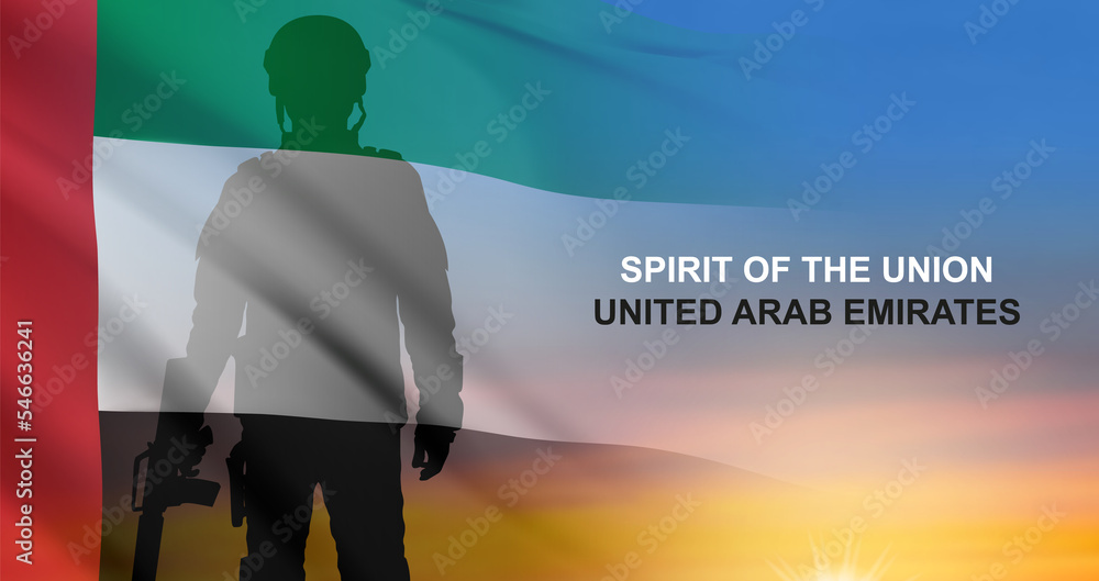 Silhouette of a soldier on background of the sunrise and UAE flag ...
