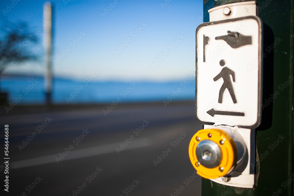 Pedestrian crosswalk push button. Stock Photo | Adobe Stock