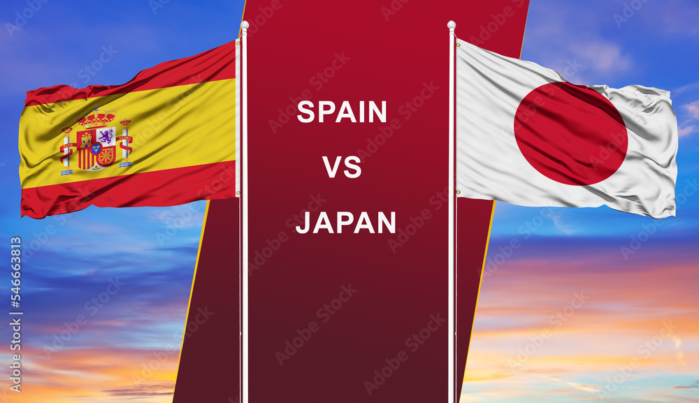Spain vs. Japan two flags on flagpoles and blue cloudy sky background ...