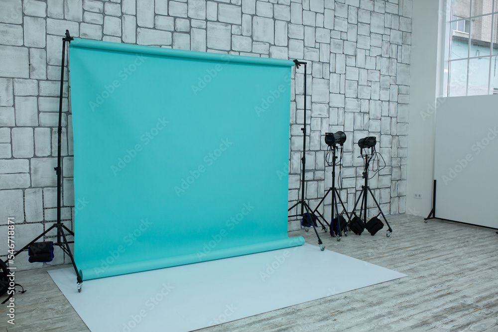 backdrops of studio equipment for photo shoots. rolls of paper ...