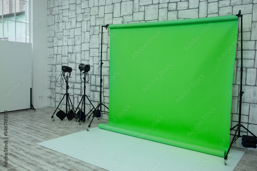 backdrops of studio equipment for photo shoots. rolls of paper ...