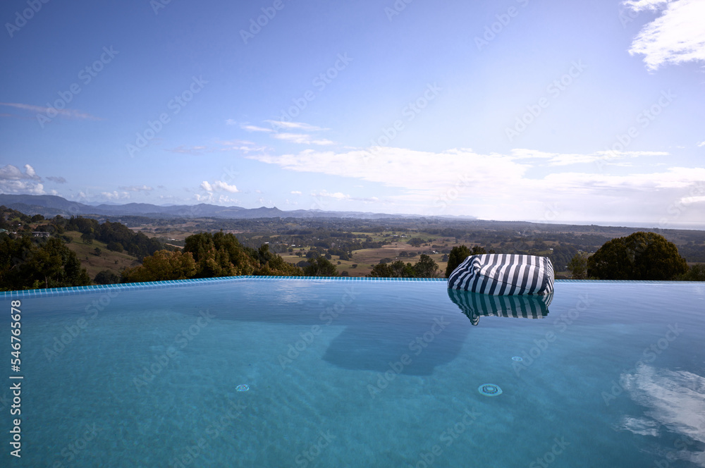 Infinity pool with floaty Stock Photo | Adobe Stock