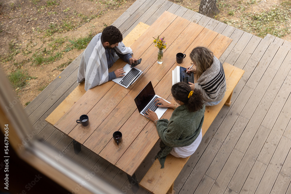 Team building On The Porch Of A Cottage House Stock Photo | Adobe Stock