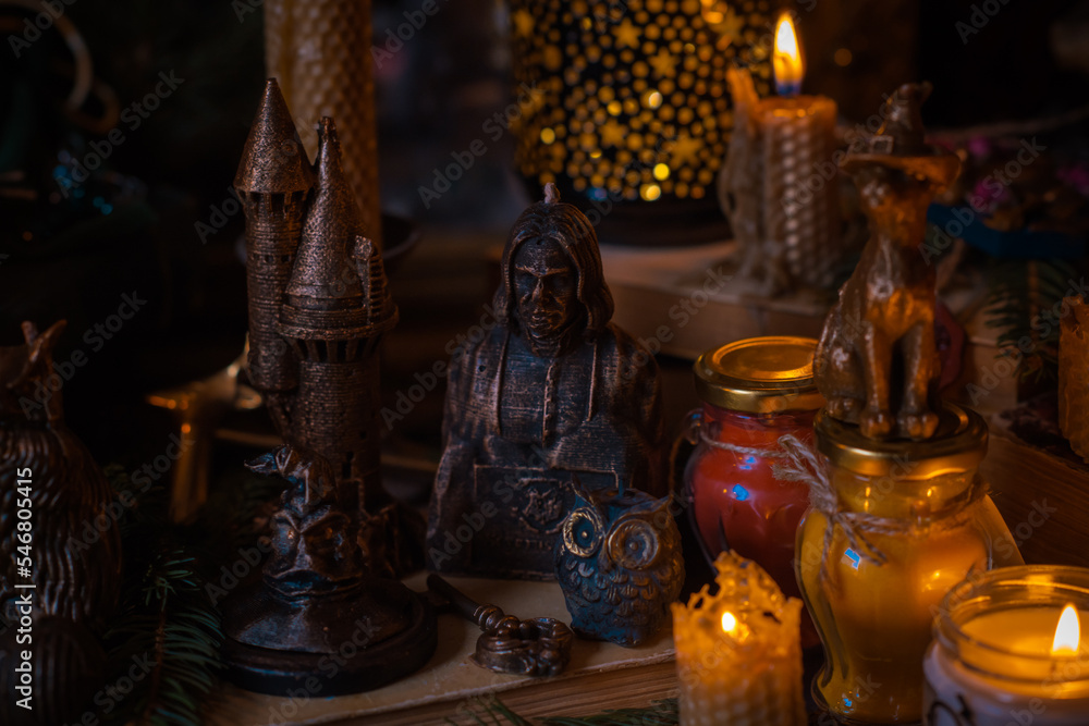 Illustration of magical stuff....candle light, magic wand, book of ...