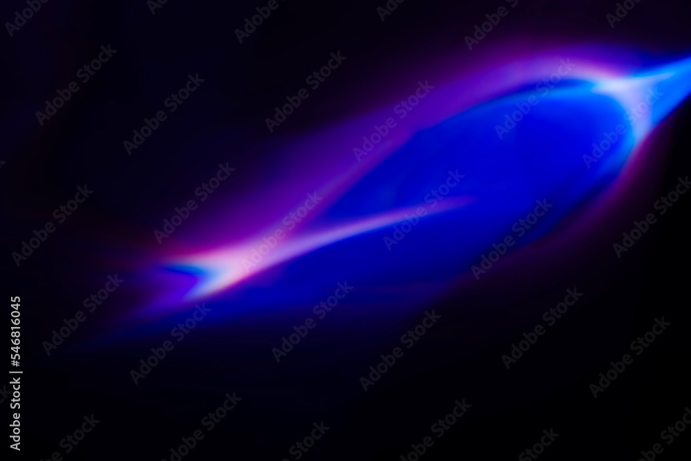Colorful blue purple rainbow light leaks texture on black background ...