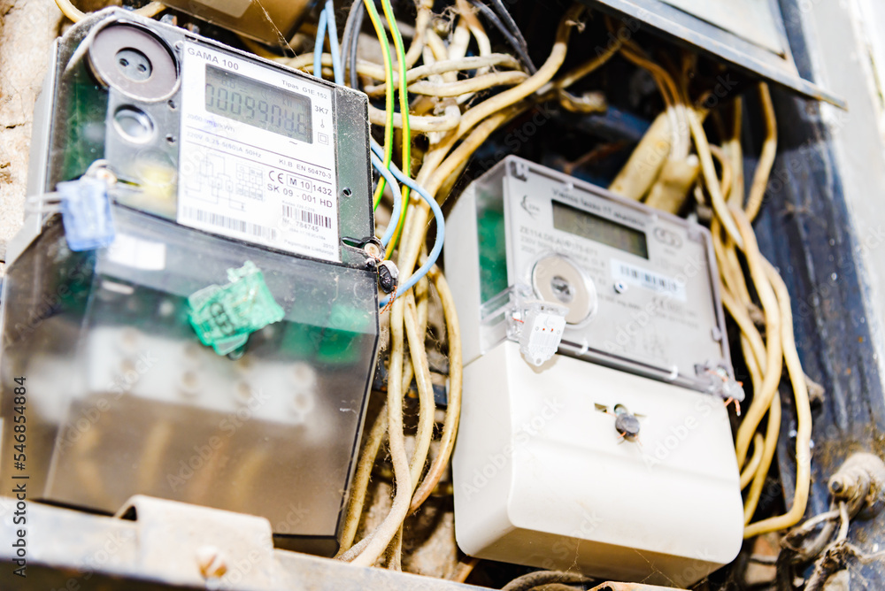 A domestic electric smart meter.Green LCD display.Concept for energy ...