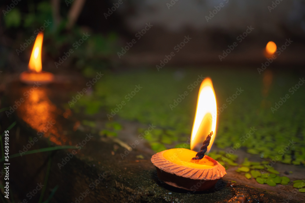 the light of the candle. The light of the candle made it more visible ...