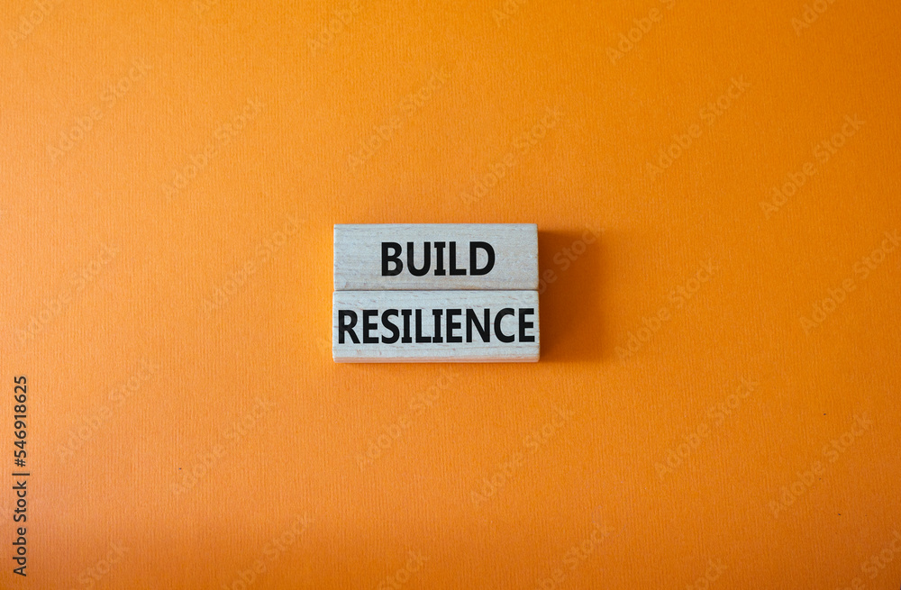 Build resilience symbol. Wooden blocks with words Build resilience ...