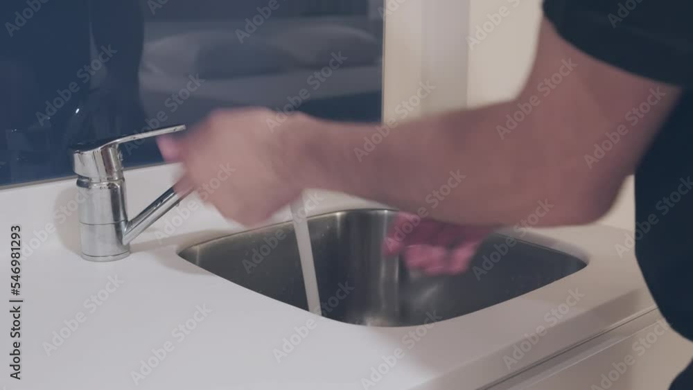 Restaurant hygiene. Cook washing his hand before cooking. Prevention of ...