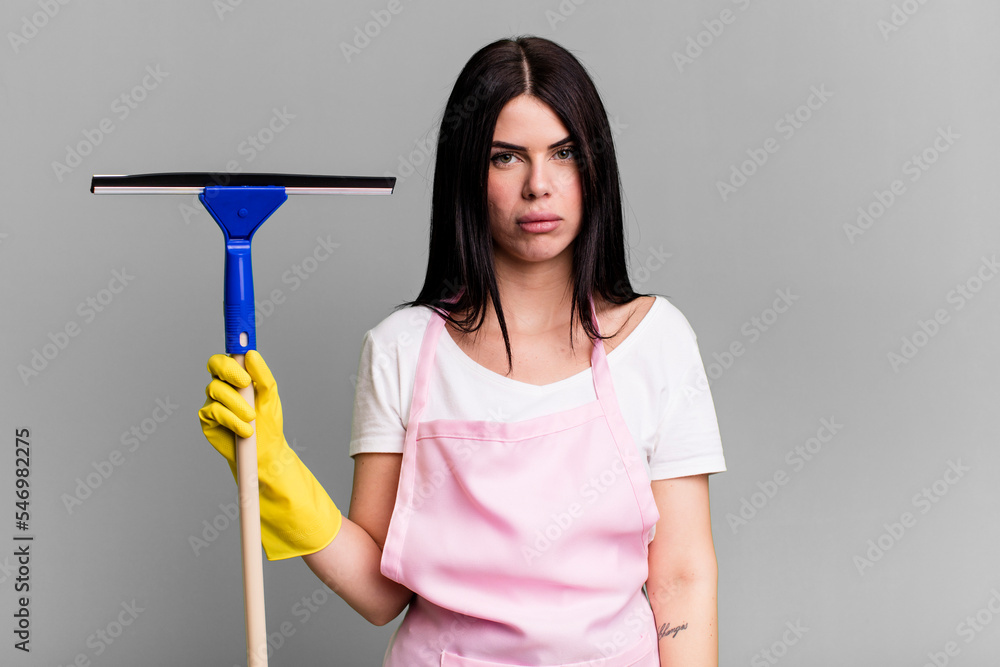 feeling sad and whiney with an unhappy look and crying. cleaning ...