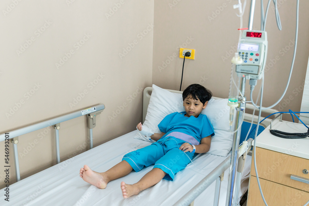 Child patient's hand has get the saline solution syringe on it. Illness ...