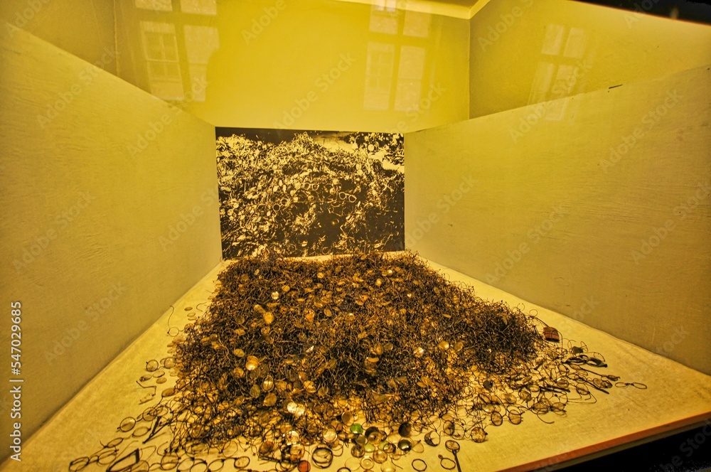 Heap of old glasses and objects inside the concentration camp Auschwitz ...