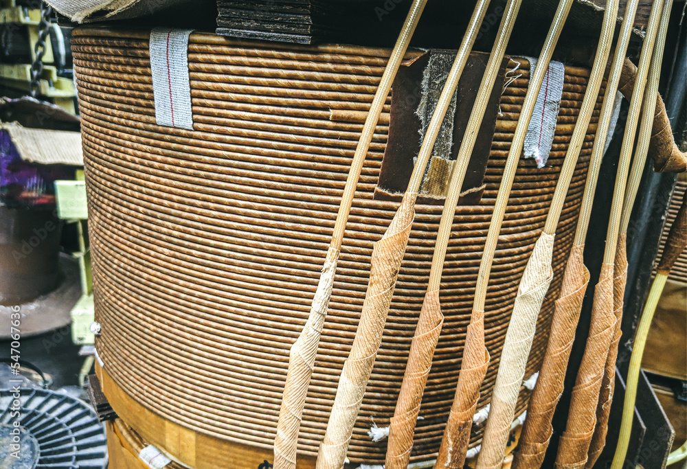 Insulated windings of three phase distribution transformer. Stock Photo ...