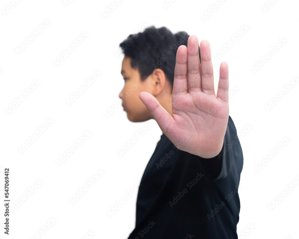 Boy standing isolated on white background doing stop sign with palm of ...